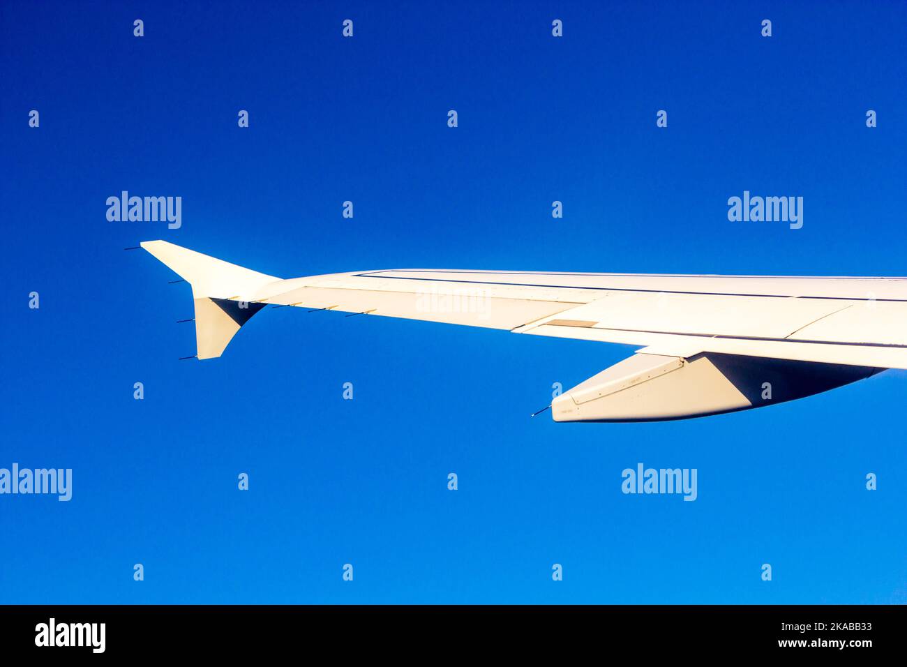 Aircraft wing some component of plane on during flying high above sky ...