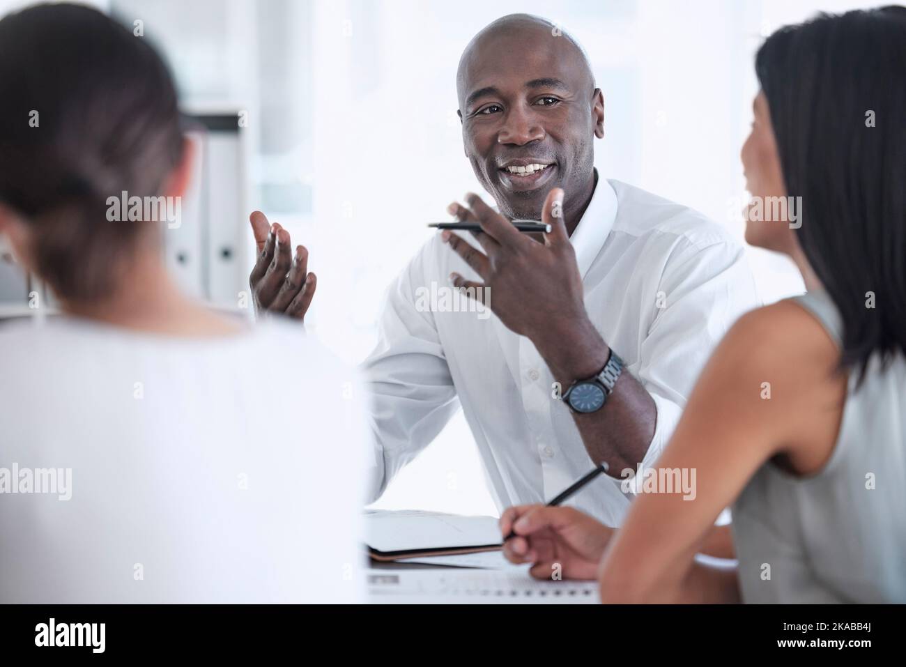 Meeting, discussion and team working on a project together in a modern ...