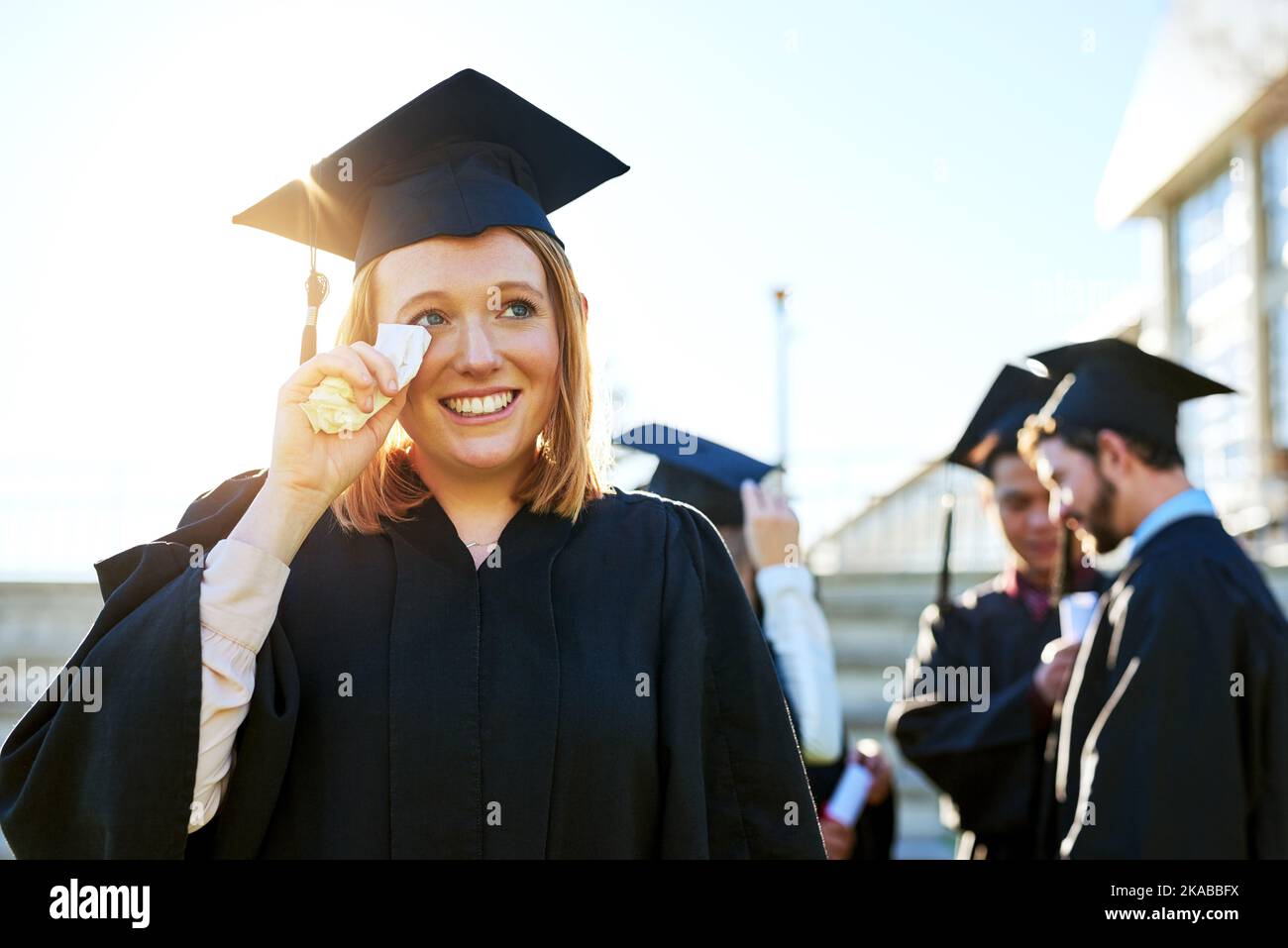 These are tears of joy. a student feeling emotional on graduation day ...