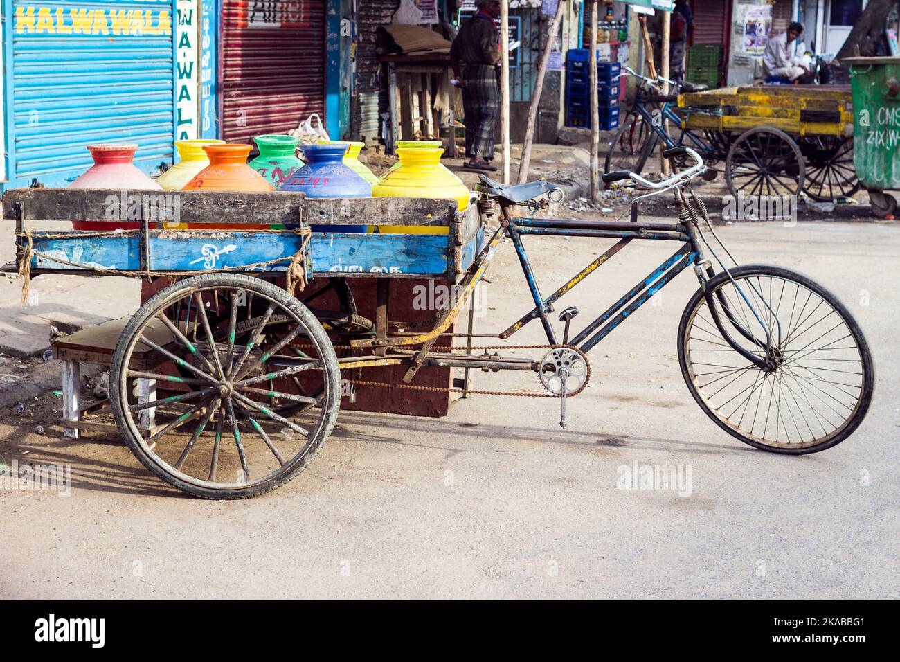 three wheeler bike at the market with drinking water and juices Stock ...