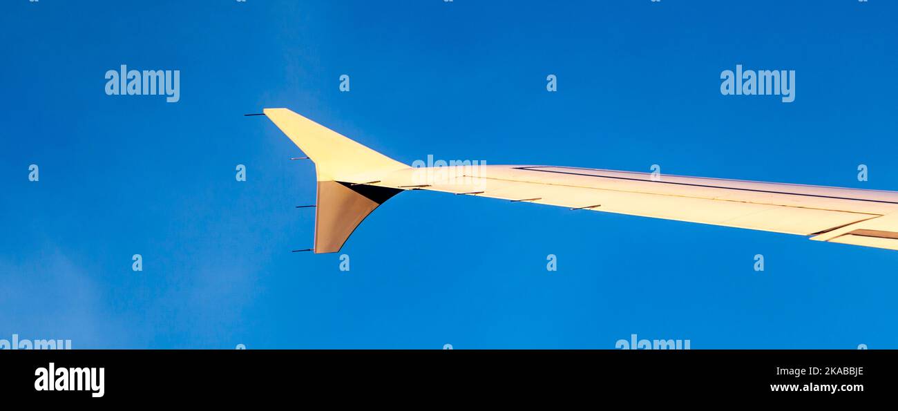 Aircraft wing some component of plane on during flying high above sky ...