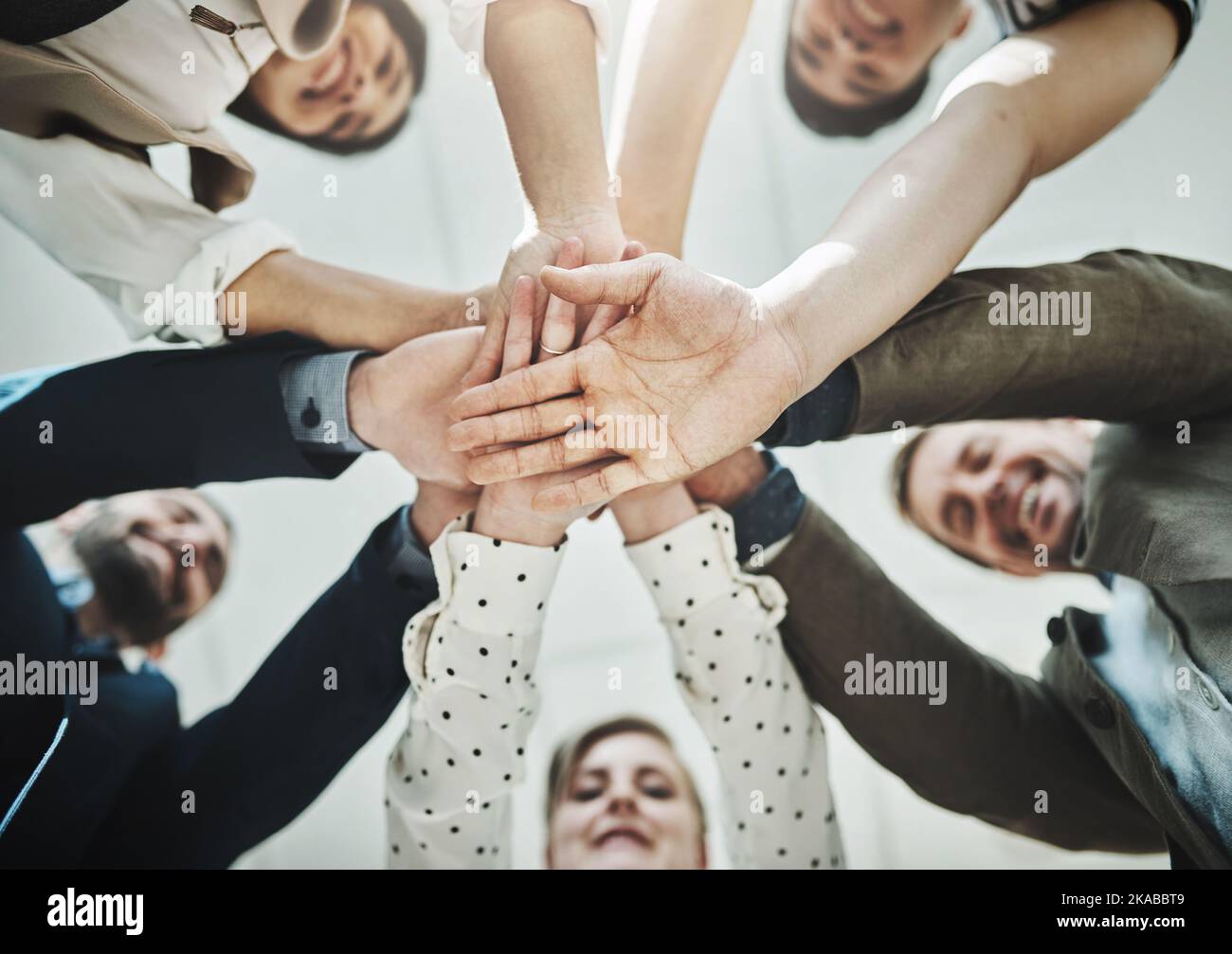 Aiming for success . Low angle shot of a group of cheerful ...