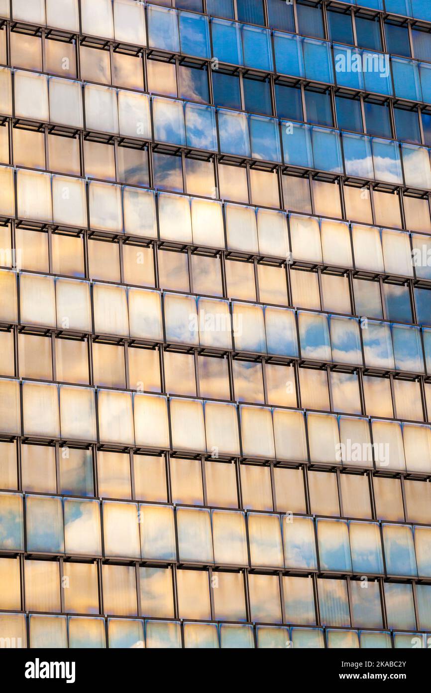 reflection of sky and clouds in a facade of a skyscraper Stock Photo ...