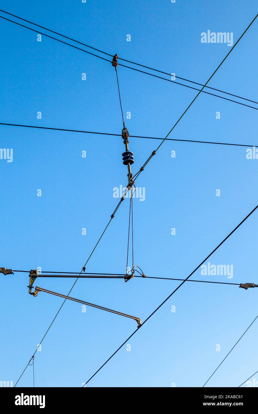 Railroad overhead lines against clear blue sky, Contact wire Stock ...