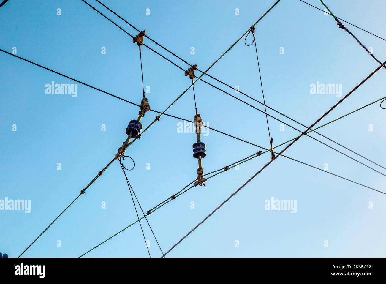 Railroad overhead lines against clear blue sky, Contact wire Stock ...