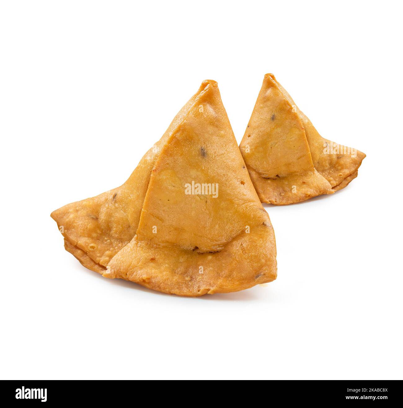 Two samosas with meat and vegetables isolated on white background ...