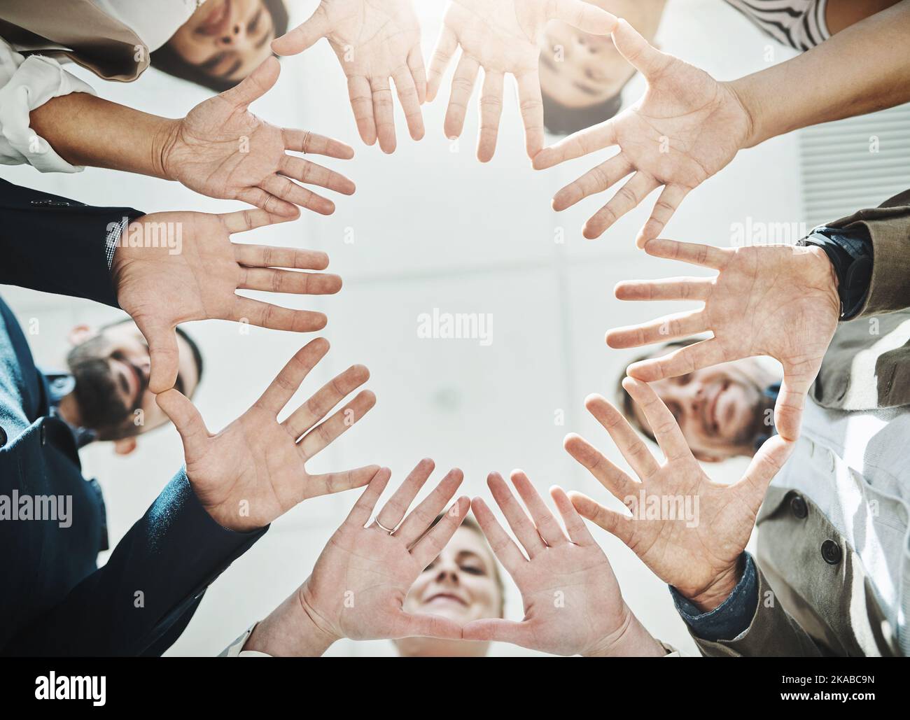 This is what working hands look like. Low angle shot of a group of ...