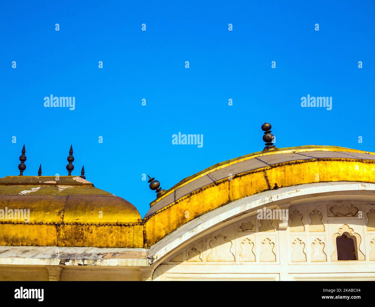 roof details of the red fort under blue sky in Agra, India Stock Photo ...