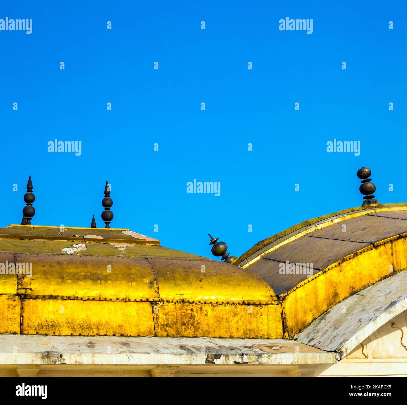 roof details of the red fort under blue sky in Agra, India Stock Photo ...