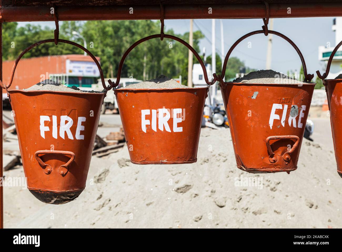 bucket with sand in a petrol station for fire fighting Stock Photo - Alamy