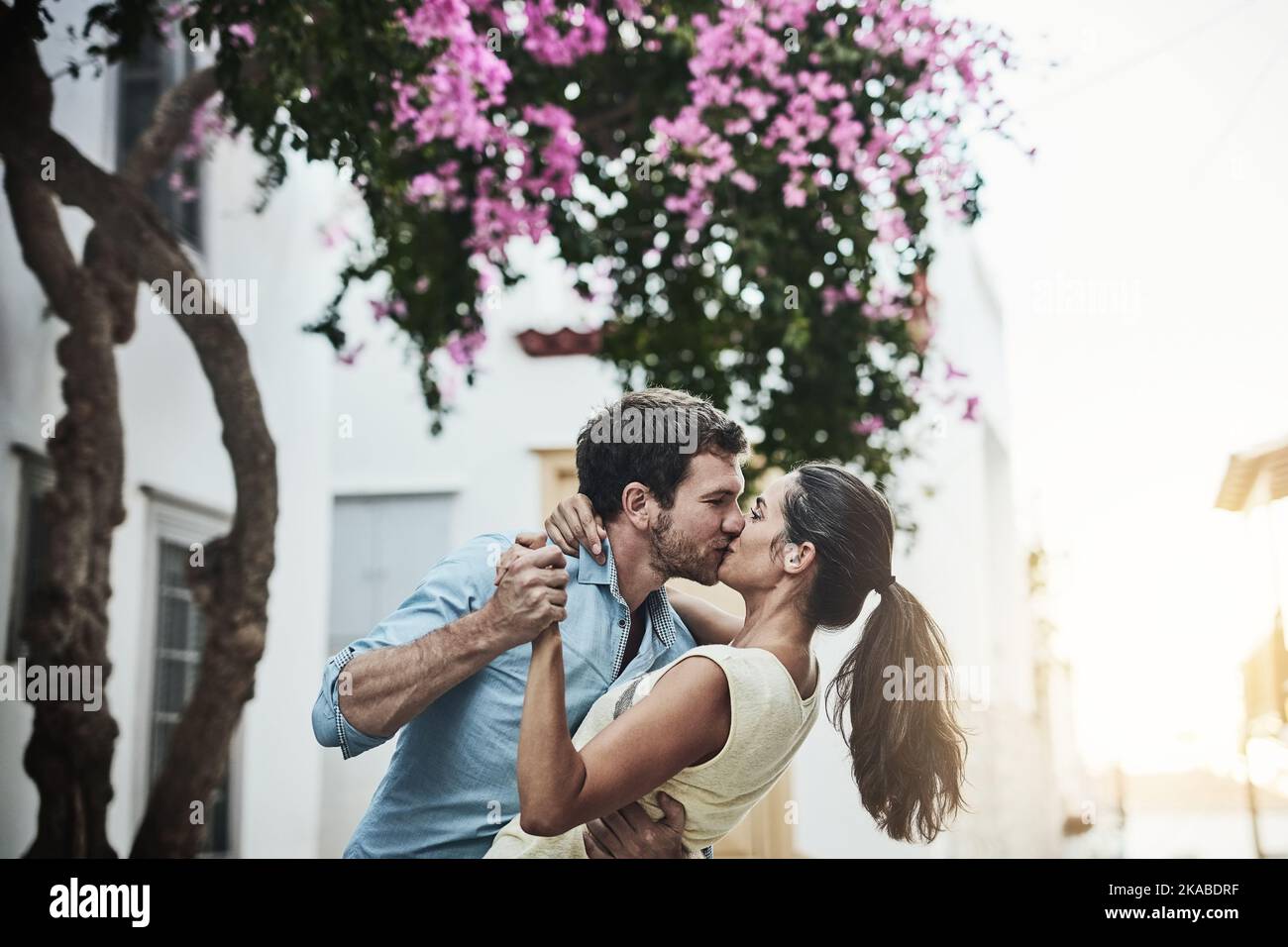 You make me feel like a teenage in love. an affectionate couple kissing ...