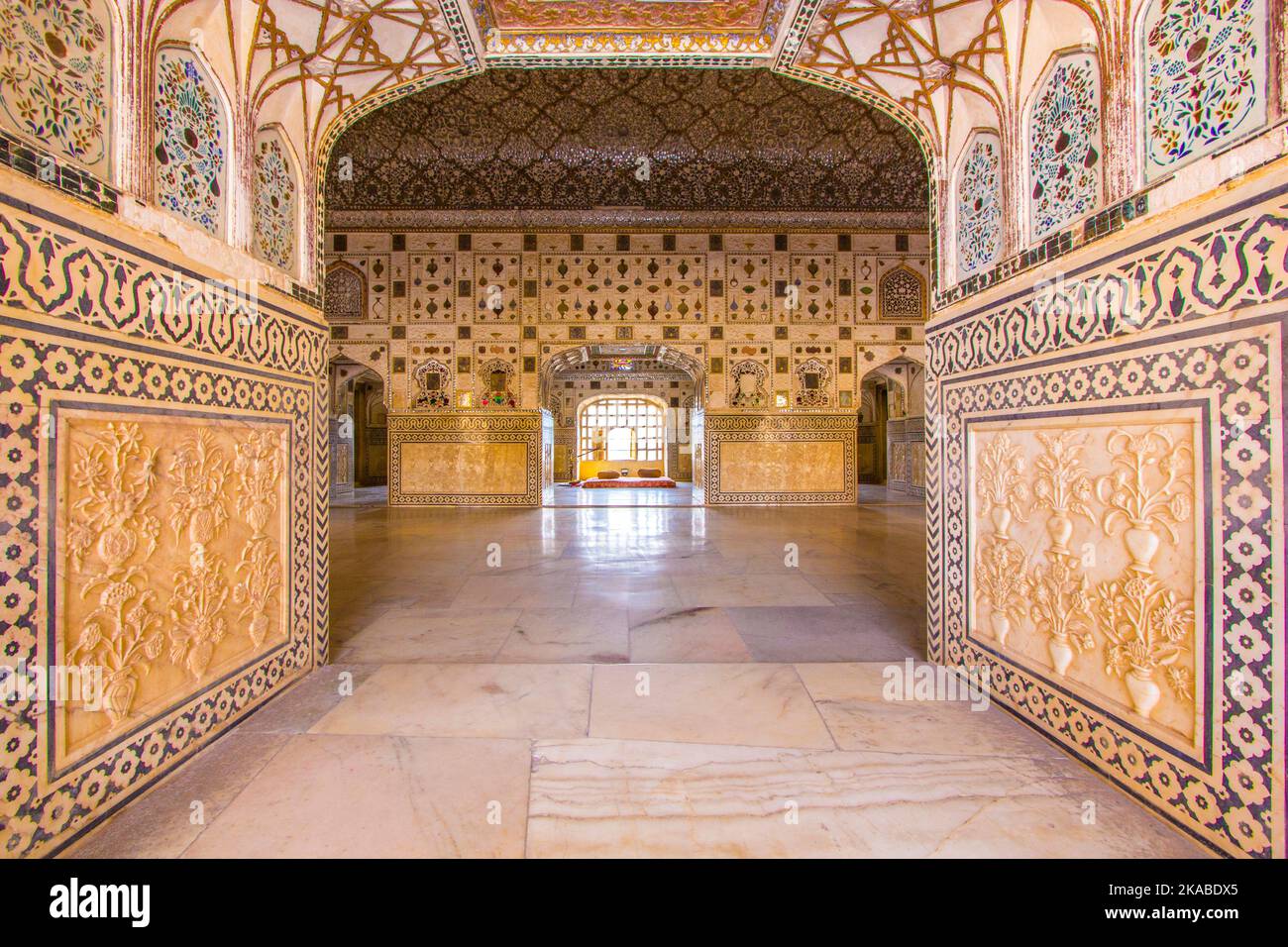 details of walls with silver and mirrors in rich decorated Amber fort ...
