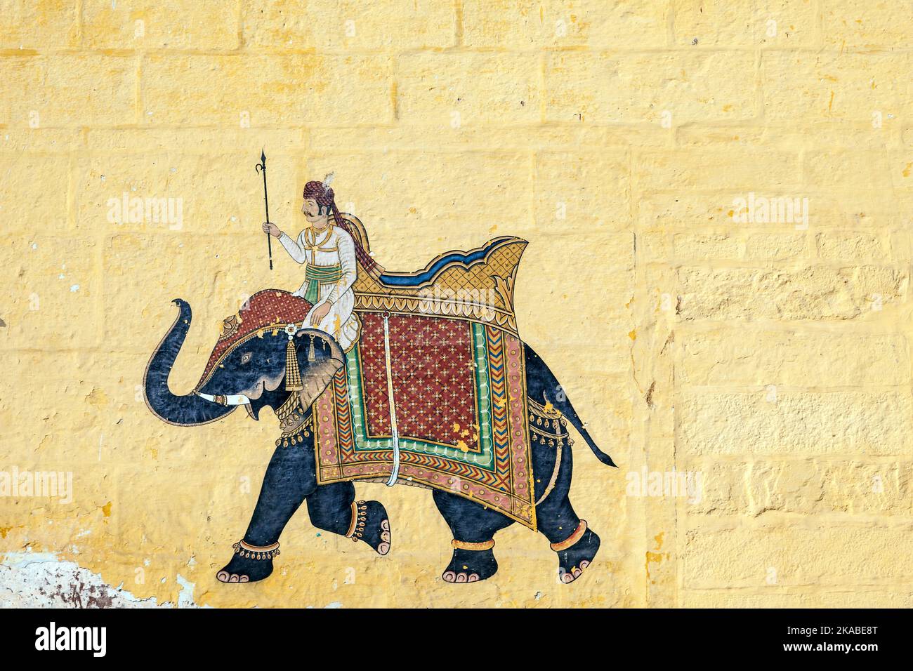 colorful indian mural in the fort at Jodhpur showing a royal procession ...