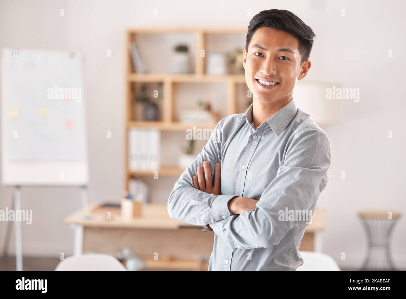 Smiling young asian graphic hi-res stock photography and images - Alamy