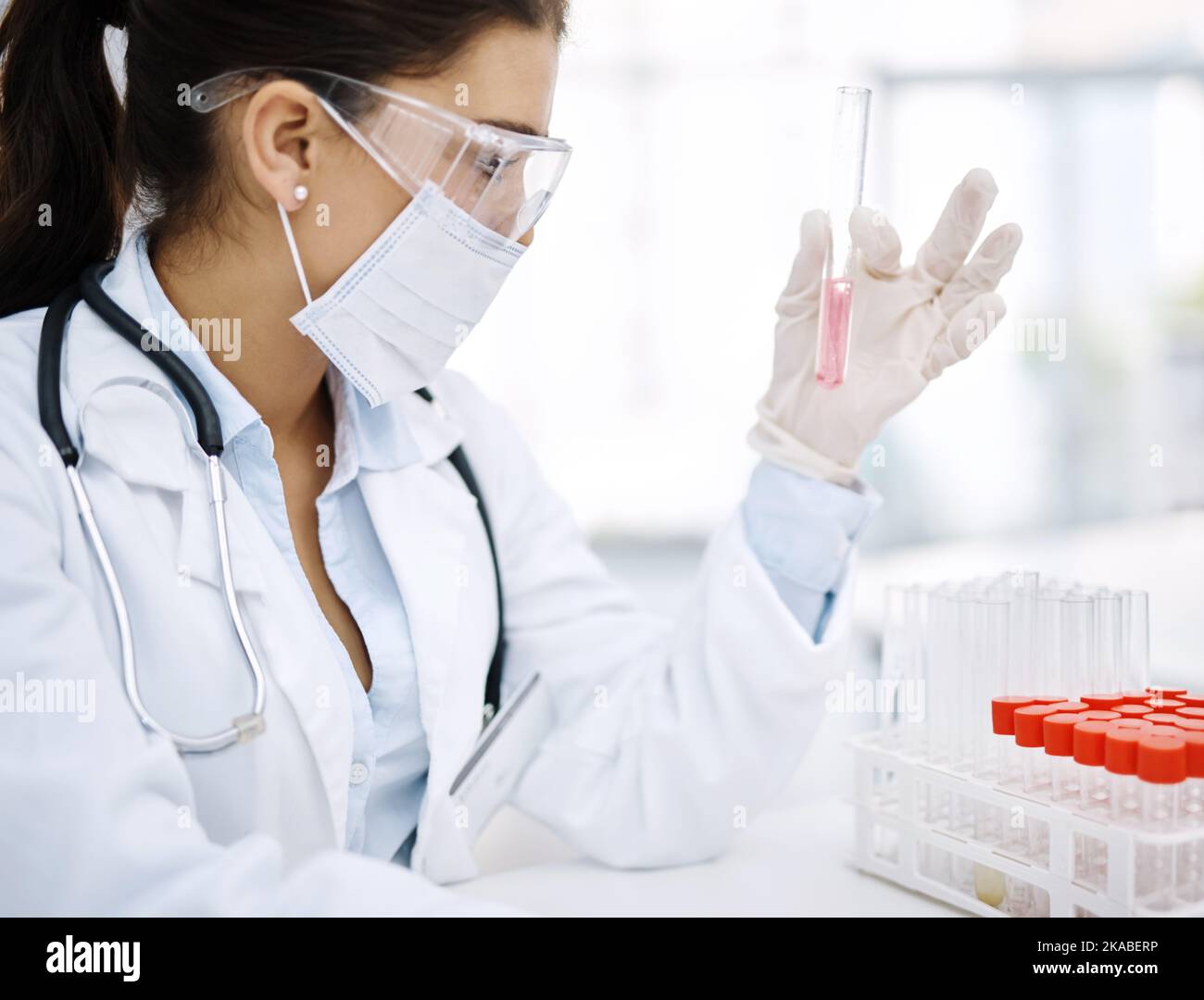 Shell find the cure. a young scientist working in a lab Stock Photo - Alamy