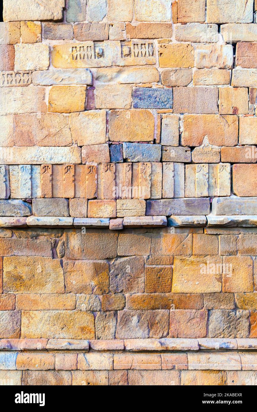 stones at the wall of Qutub Minar Tower, the tallest brick minaret in ...