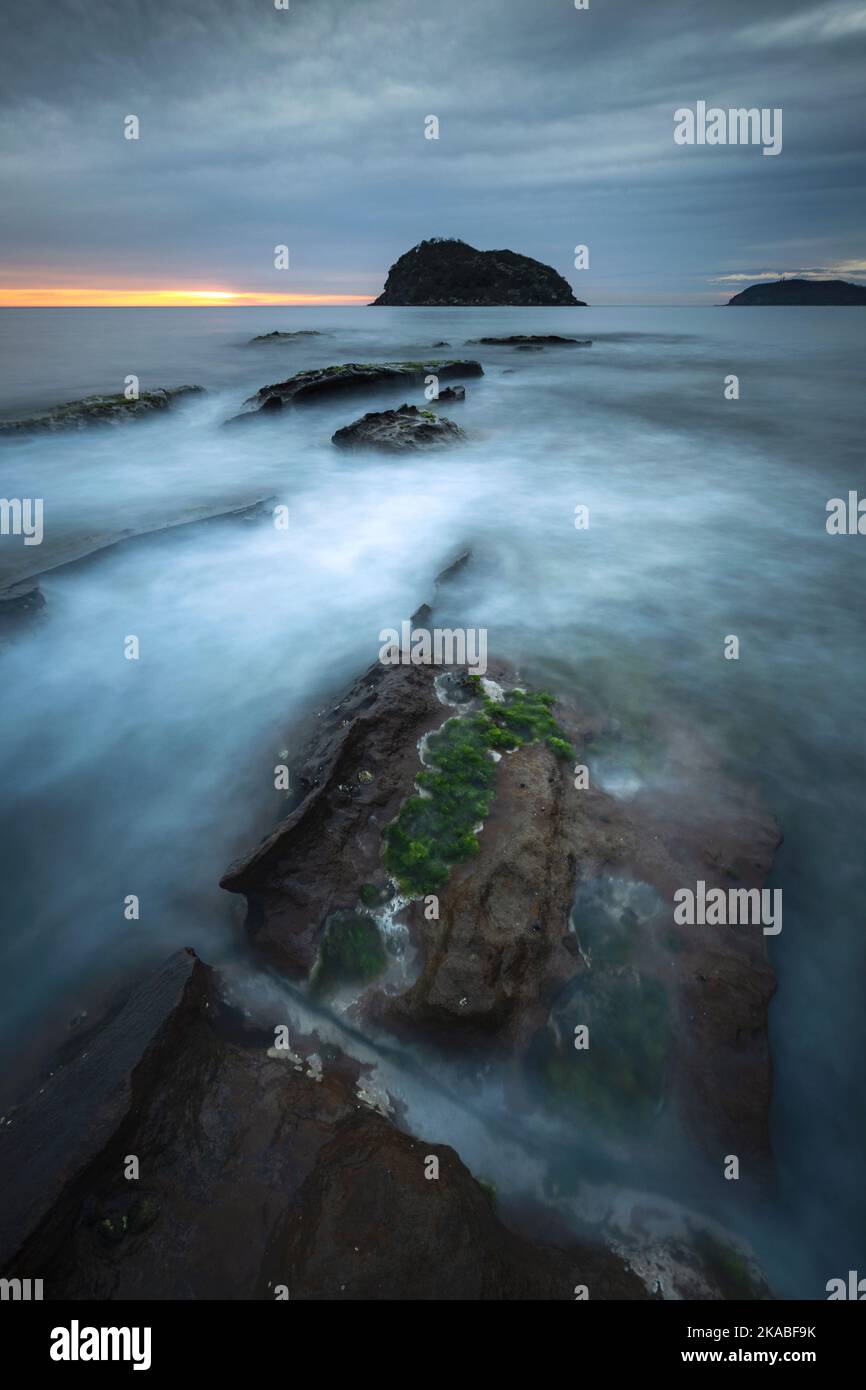 long exposure water with rocks near lion island on nsw central coast ...