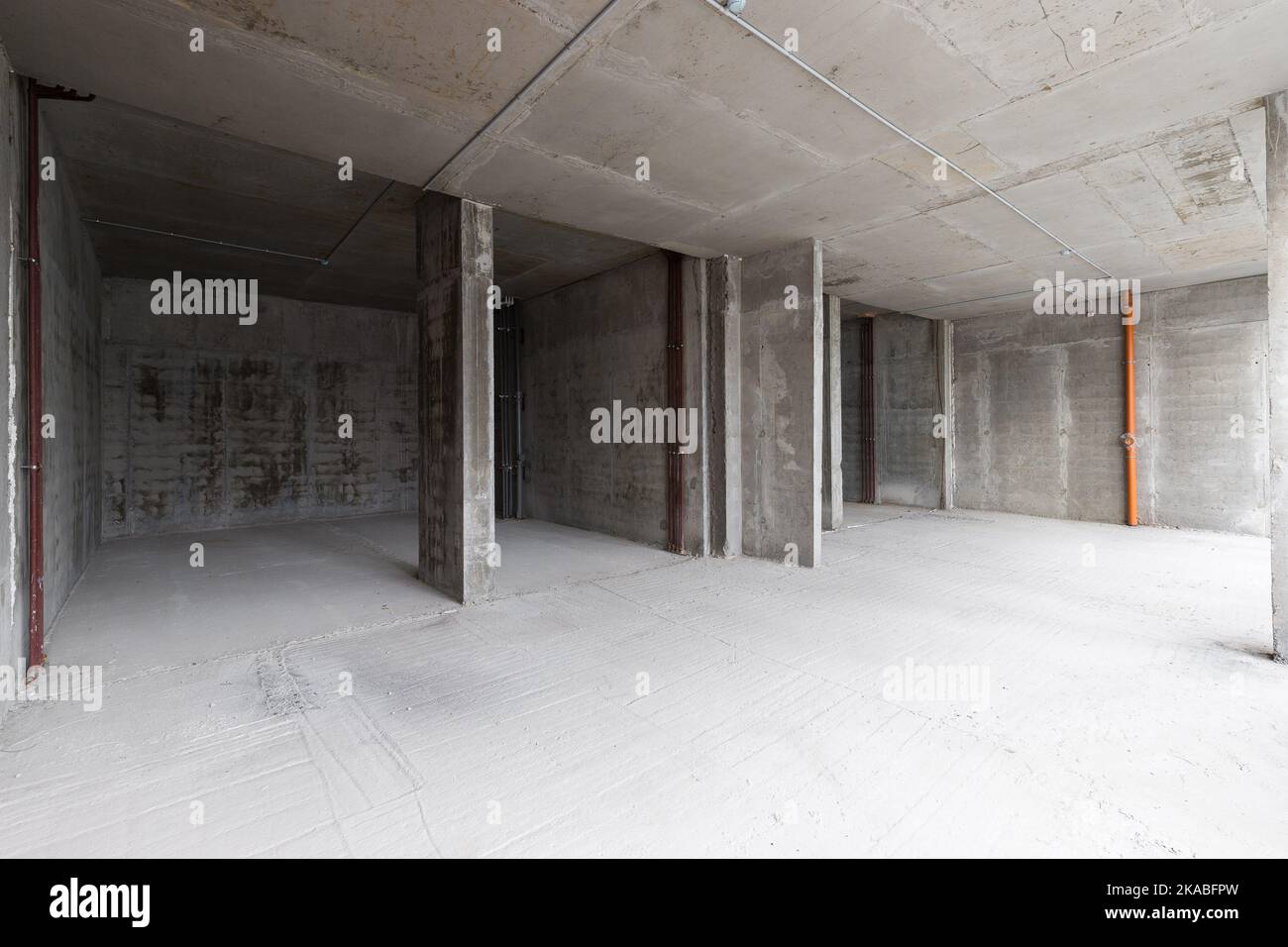 Empty concrete commercial space without finishing with partitions Stock ...