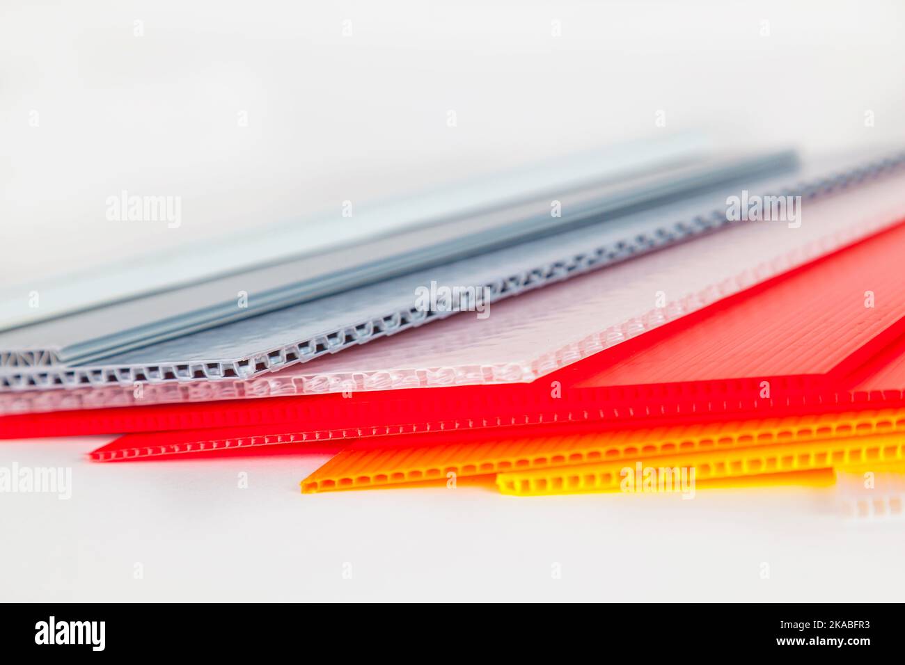 plastic packaging material in different colors Stock Photo - Alamy