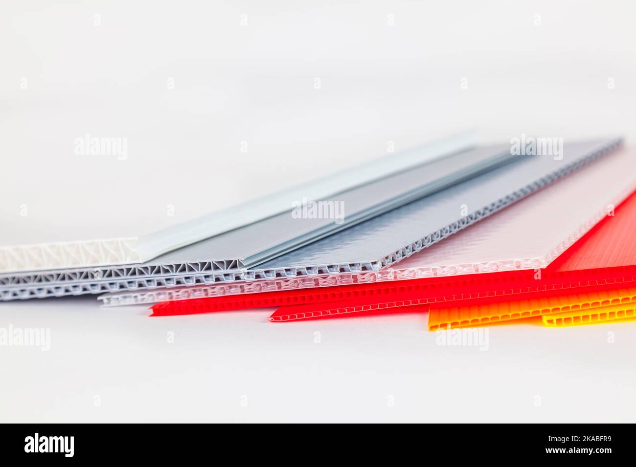 plastic packaging material in different colors Stock Photo - Alamy