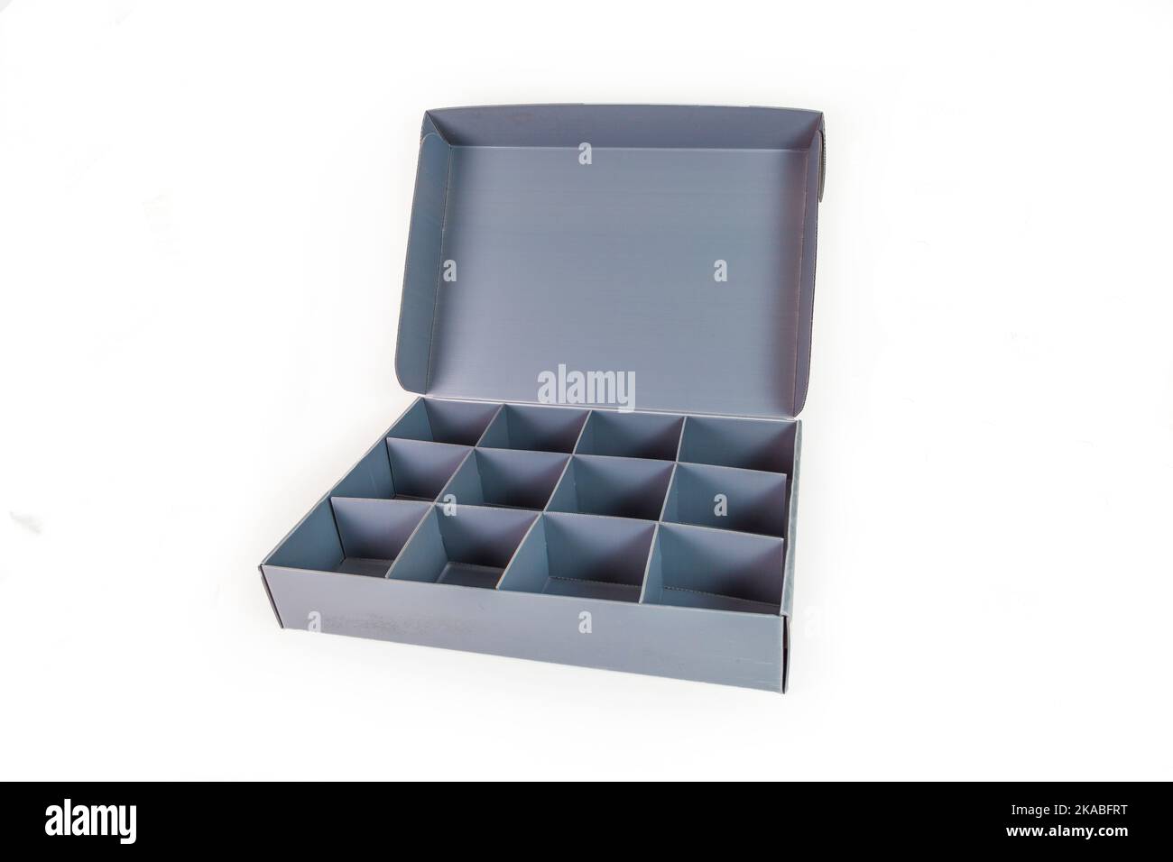 empty grey box with multiple inside storage shelves Stock Photo - Alamy