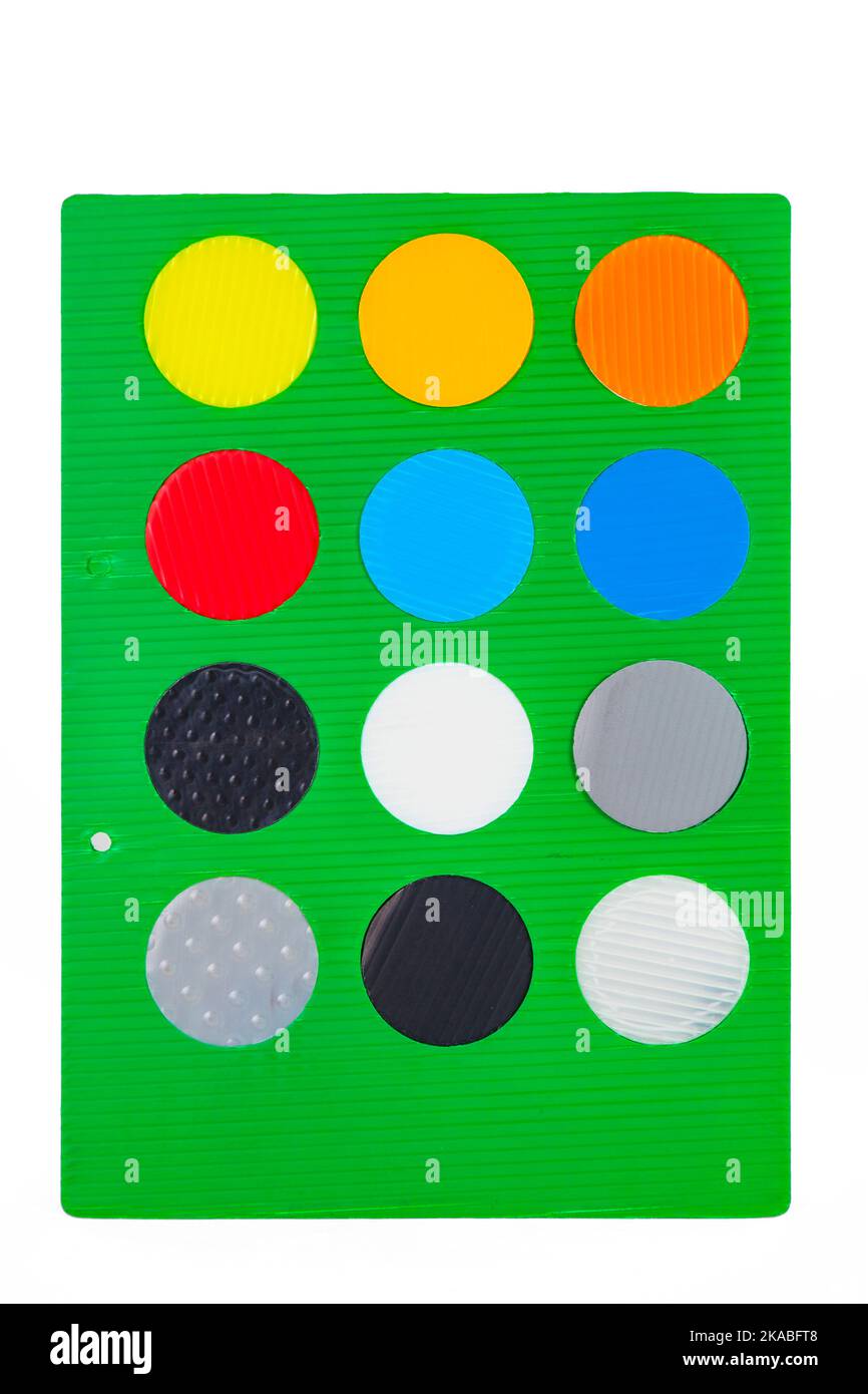 green sheet with different colorful round color samples Stock Photo - Alamy
