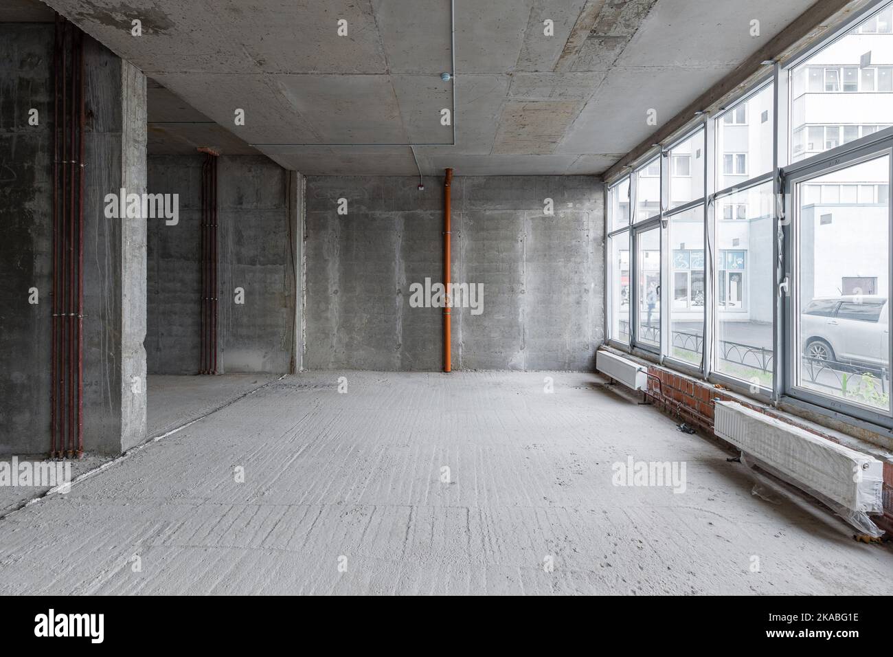 Empty concrete commercial space without finishing with partitions Stock ...
