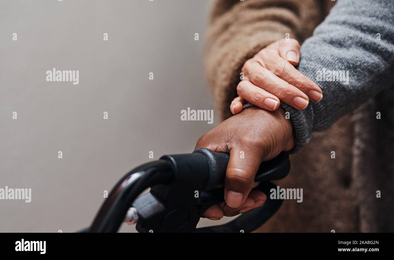 Ill always give you a helping hand. an unrecognizable senior woman ...