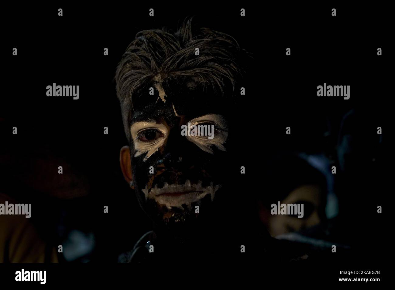 Tonacatepeque, El Salvador. 01st Nov, 2022. A reveler dressed up ...