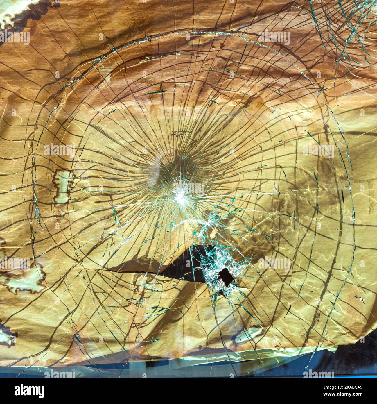 broken glass with cardboard to cover the hole Stock Photo - Alamy