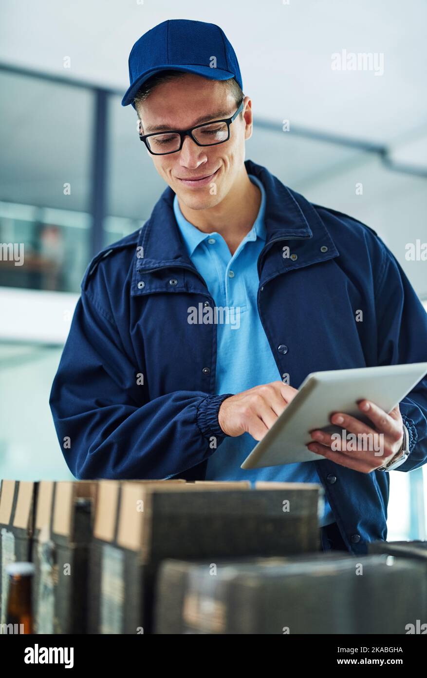 Passing through the distribution channel. a courier using a digital ...