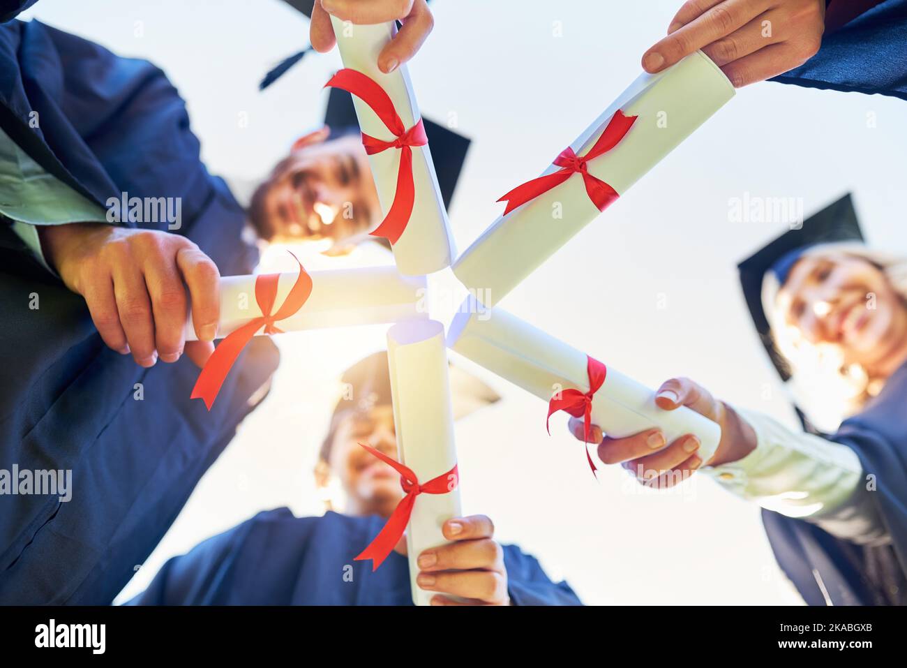 The future holds many opportunities for us. a group of students holding ...