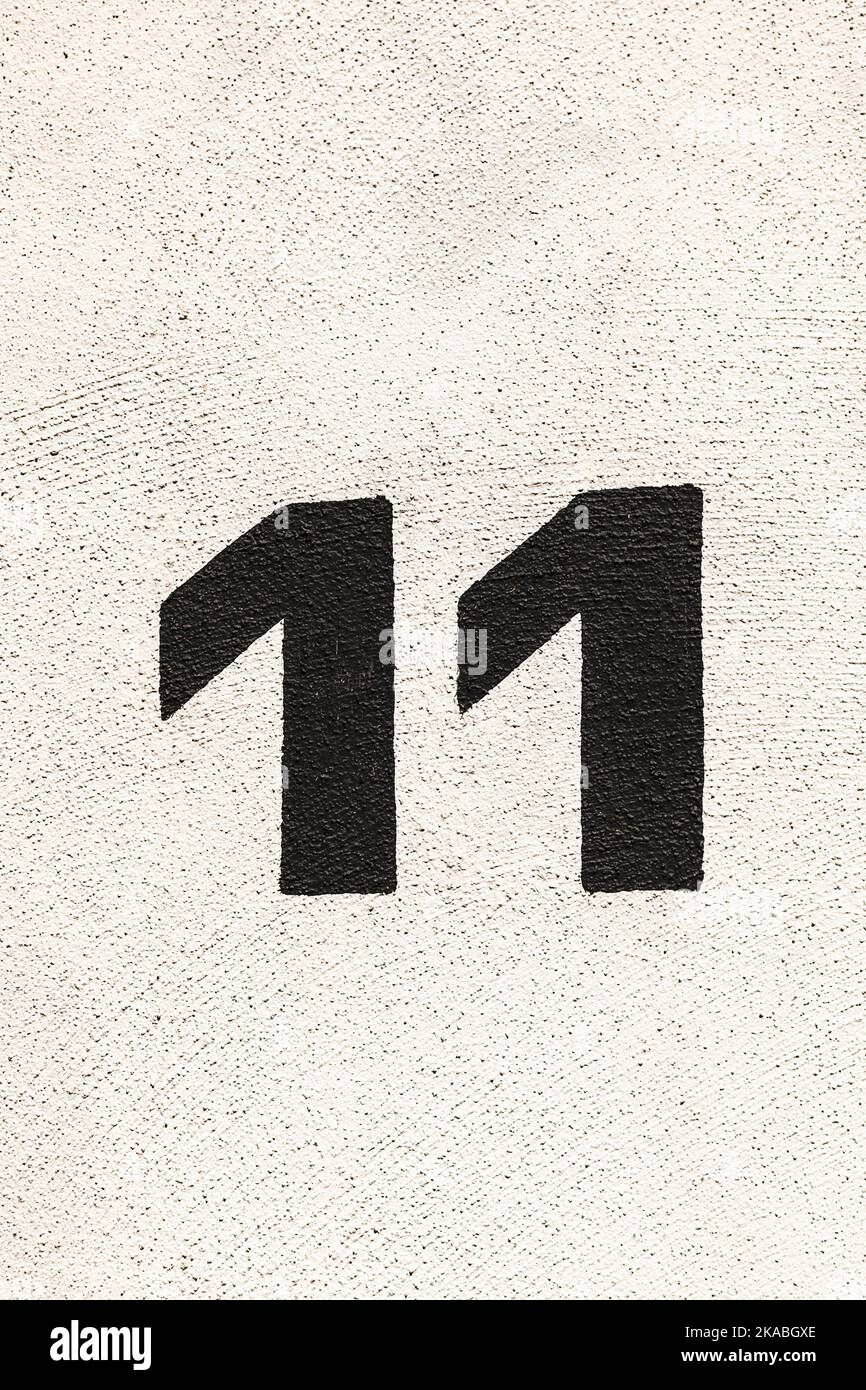 House number 11painted at the wall Stock Photo - Alamy