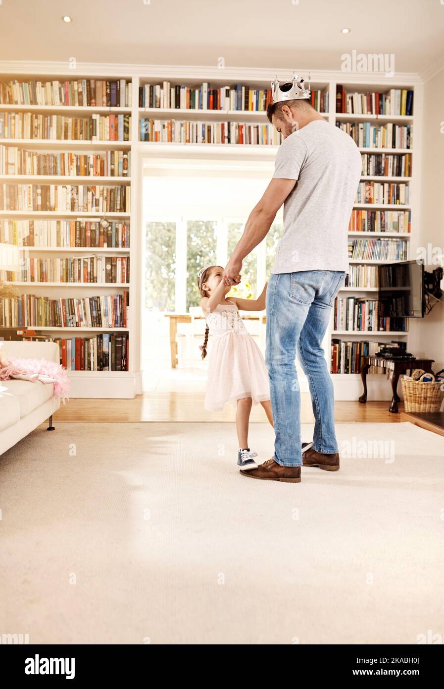 Lets see you move. a father dancing with his little daughter at home ...