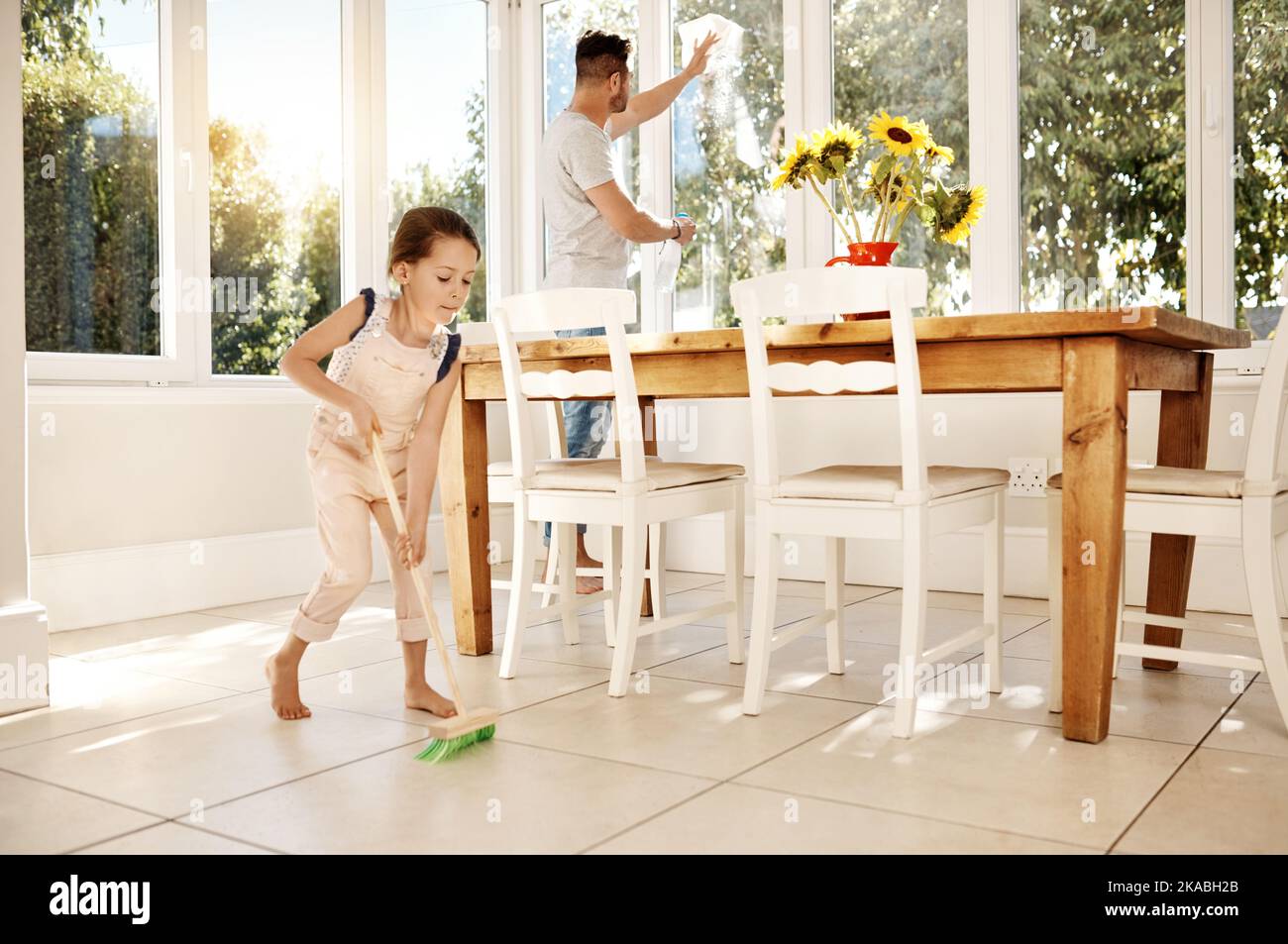 Children doing chores hi-res stock photography and images - Alamy