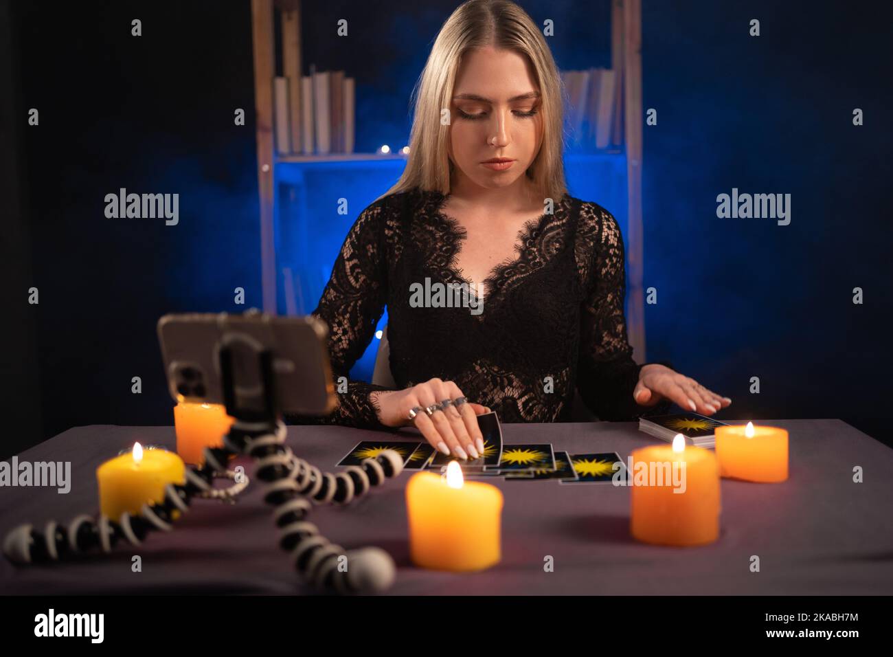 Modern technology. Female professional fortune teller holding and ...