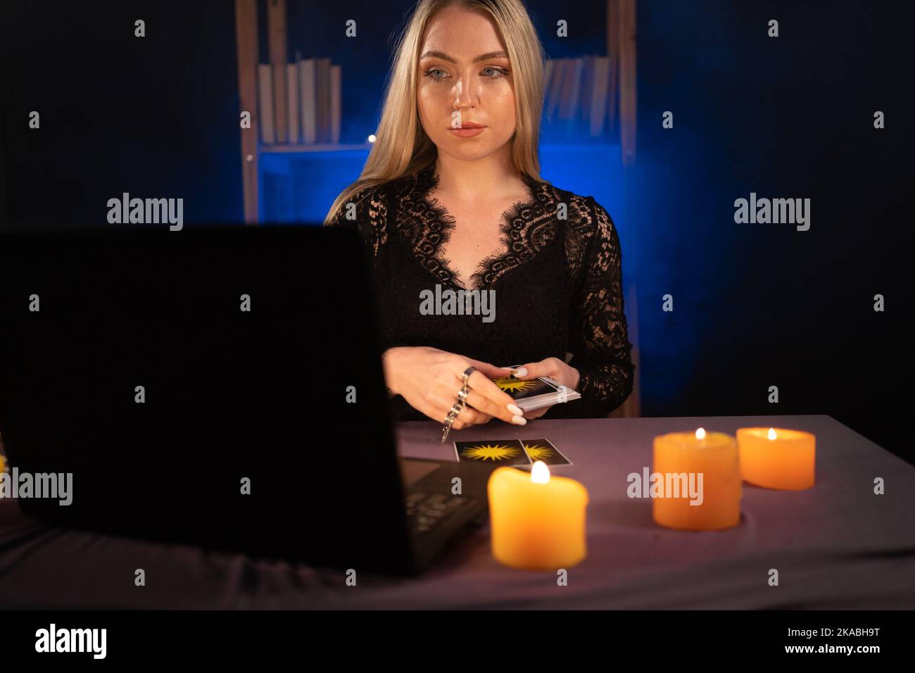 Psychic Tarot Card Reader on Laptop Computer. Focused video blogger ...