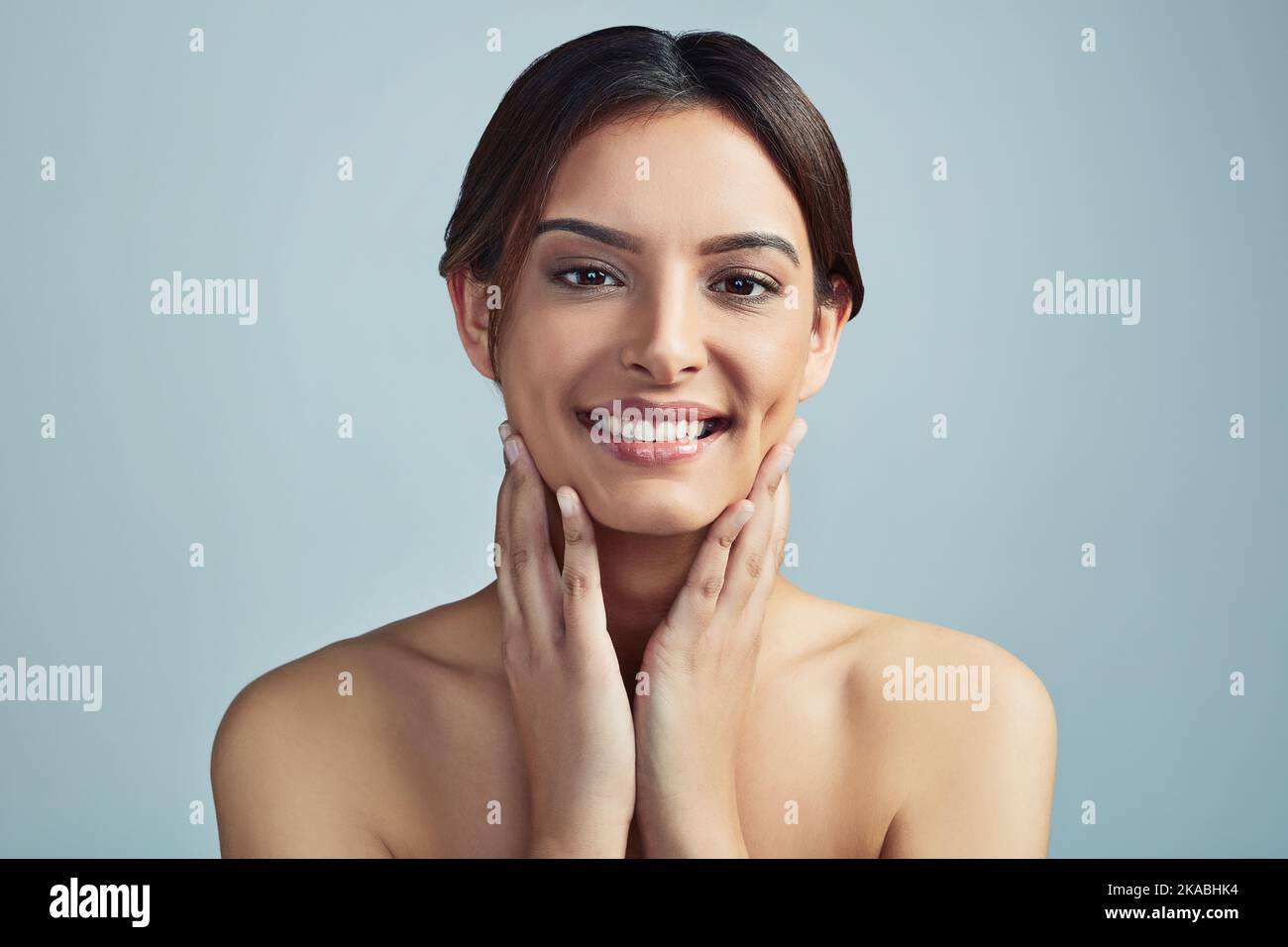 Perfect skin is enough reason to be happy. Studio portrait of a ...
