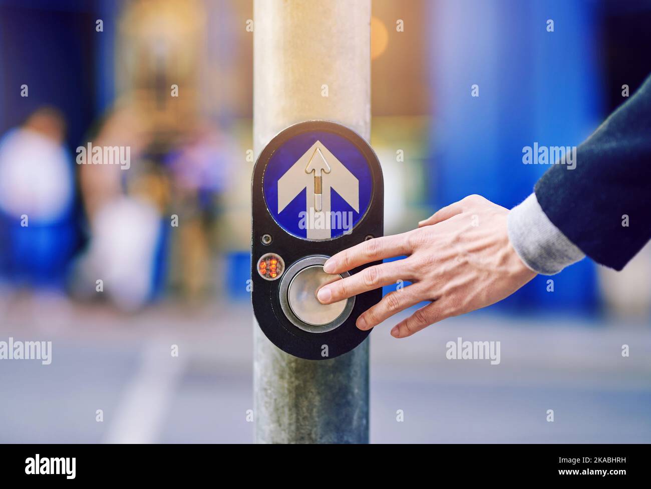 Theres a time and a place to go. a man pressing a button at a cross ...