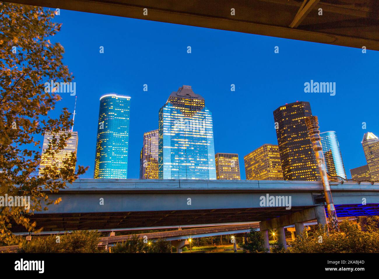 View on downtown Houston by night with skyscraper Stock Photo - Alamy