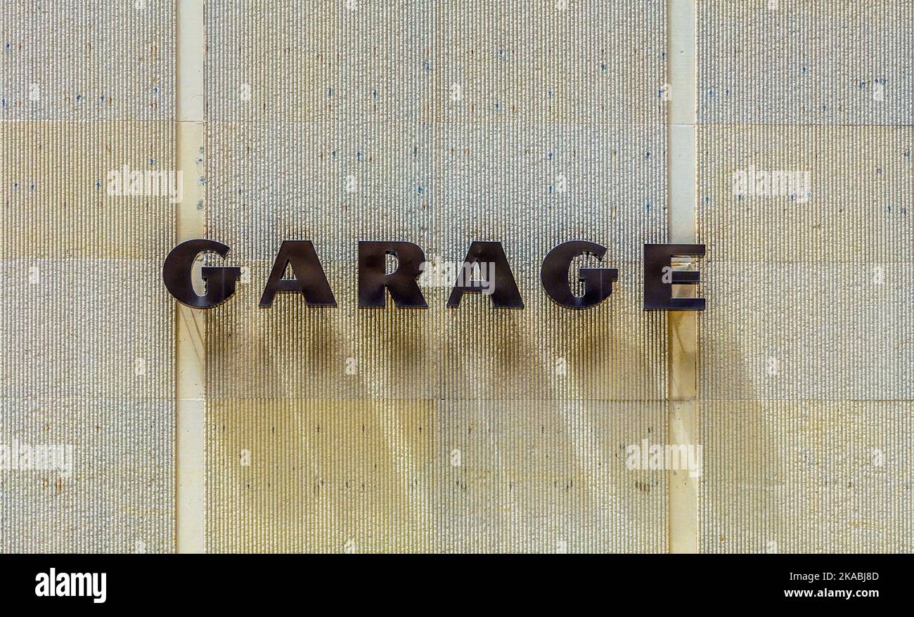 garage sign with shadow of letters Stock Photo - Alamy
