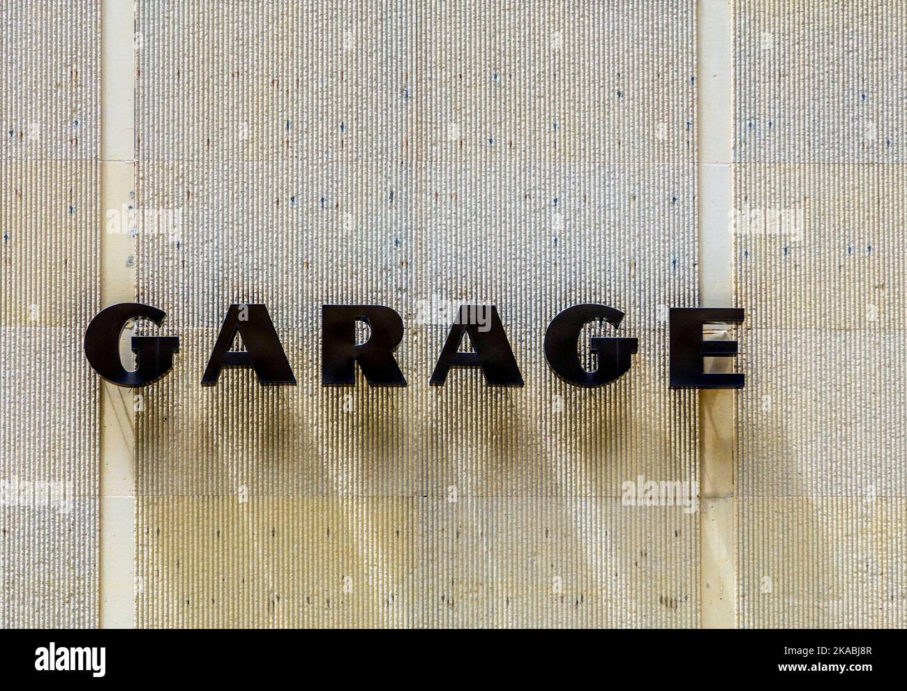 garage sign with shadow of letters Stock Photo - Alamy