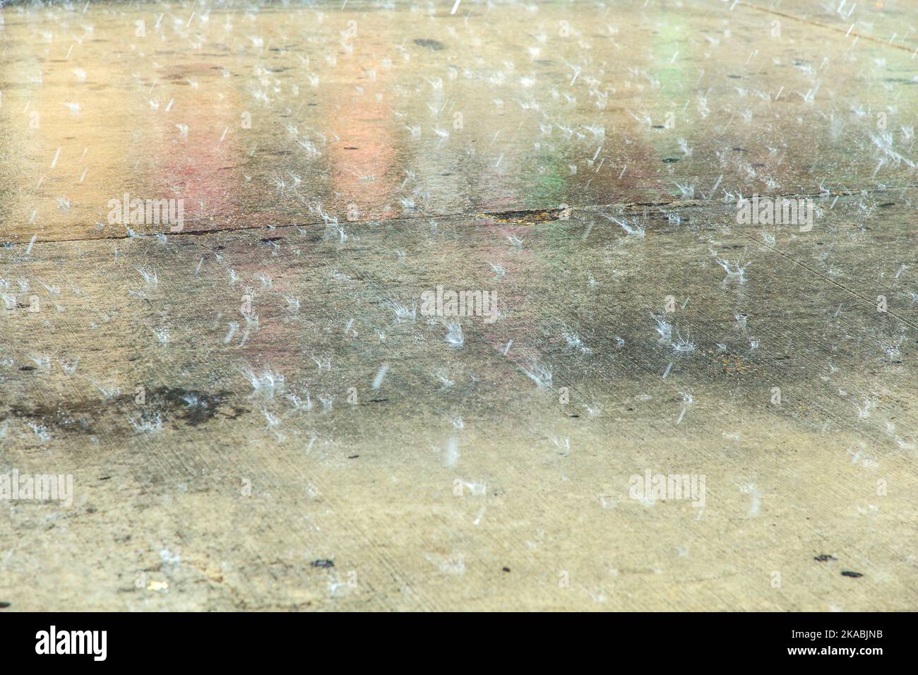Rain puddles on street raindrops hi-res stock photography and images ...