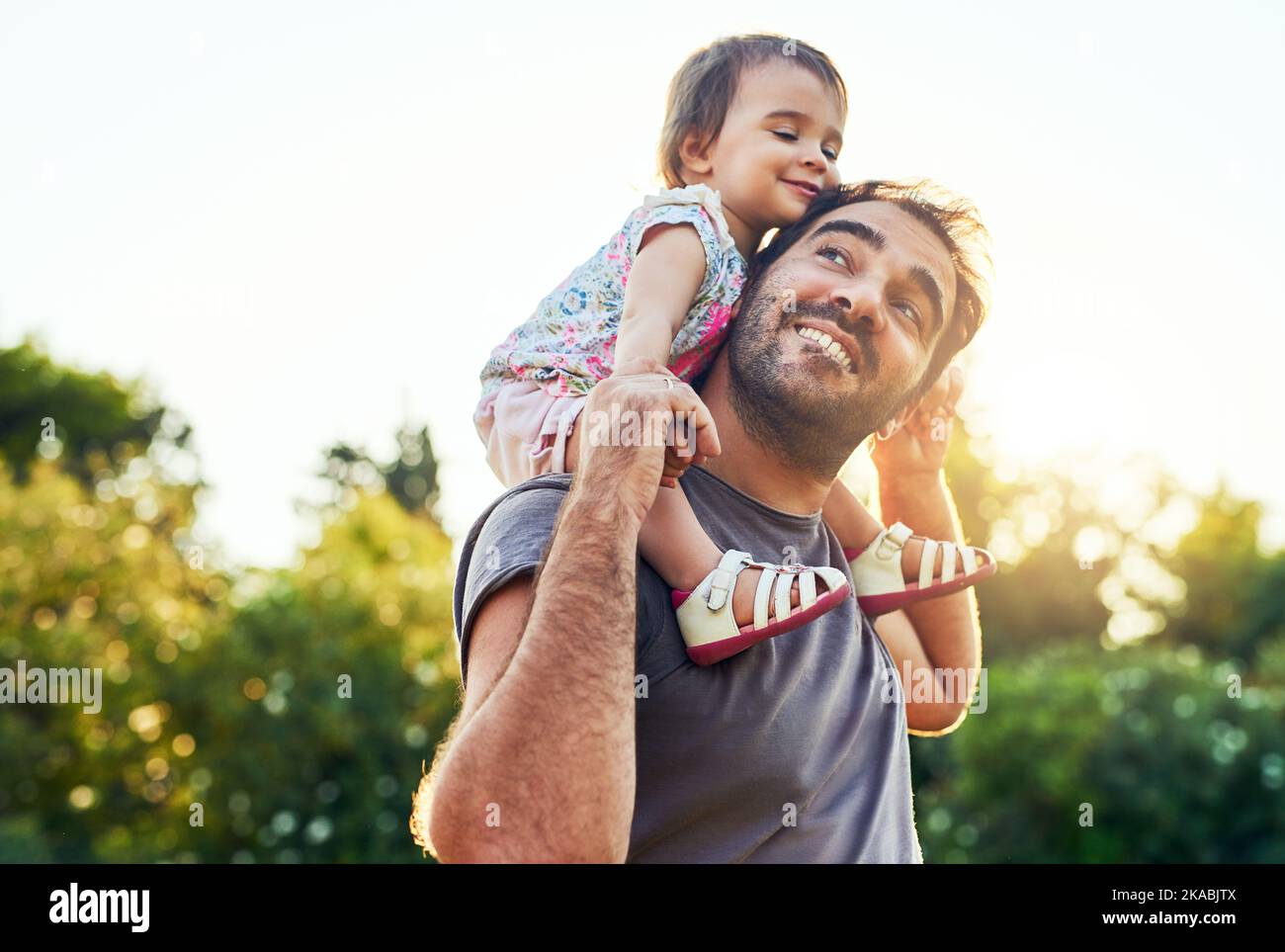 My Daddy is the best pillow. a young father with his little girl ...