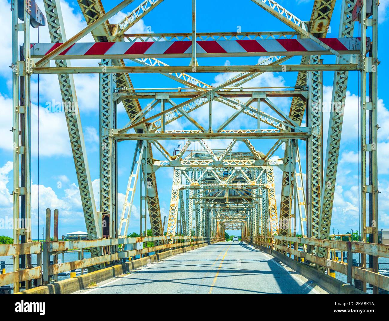 driving on Chef Menteur Highway with old bridge in East area of New ...