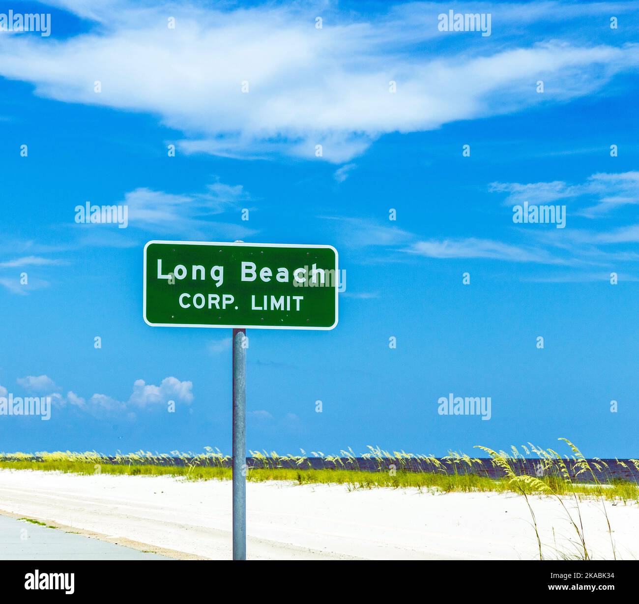 street sign Long Beach at highway 90 in Pass Christian Stock Photo - Alamy
