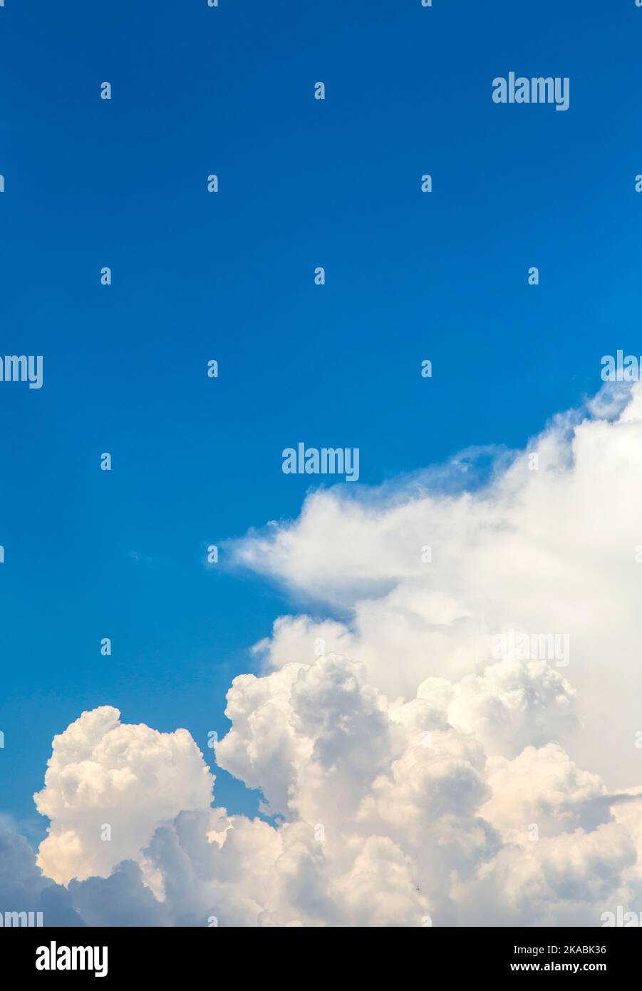 cloudy and blue sky, left corner only blue Stock Photo - Alamy