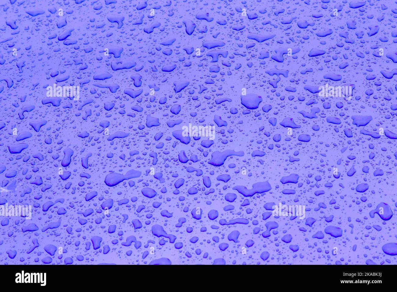 drop of water gives a harmonic structure on the metal surface of the ...