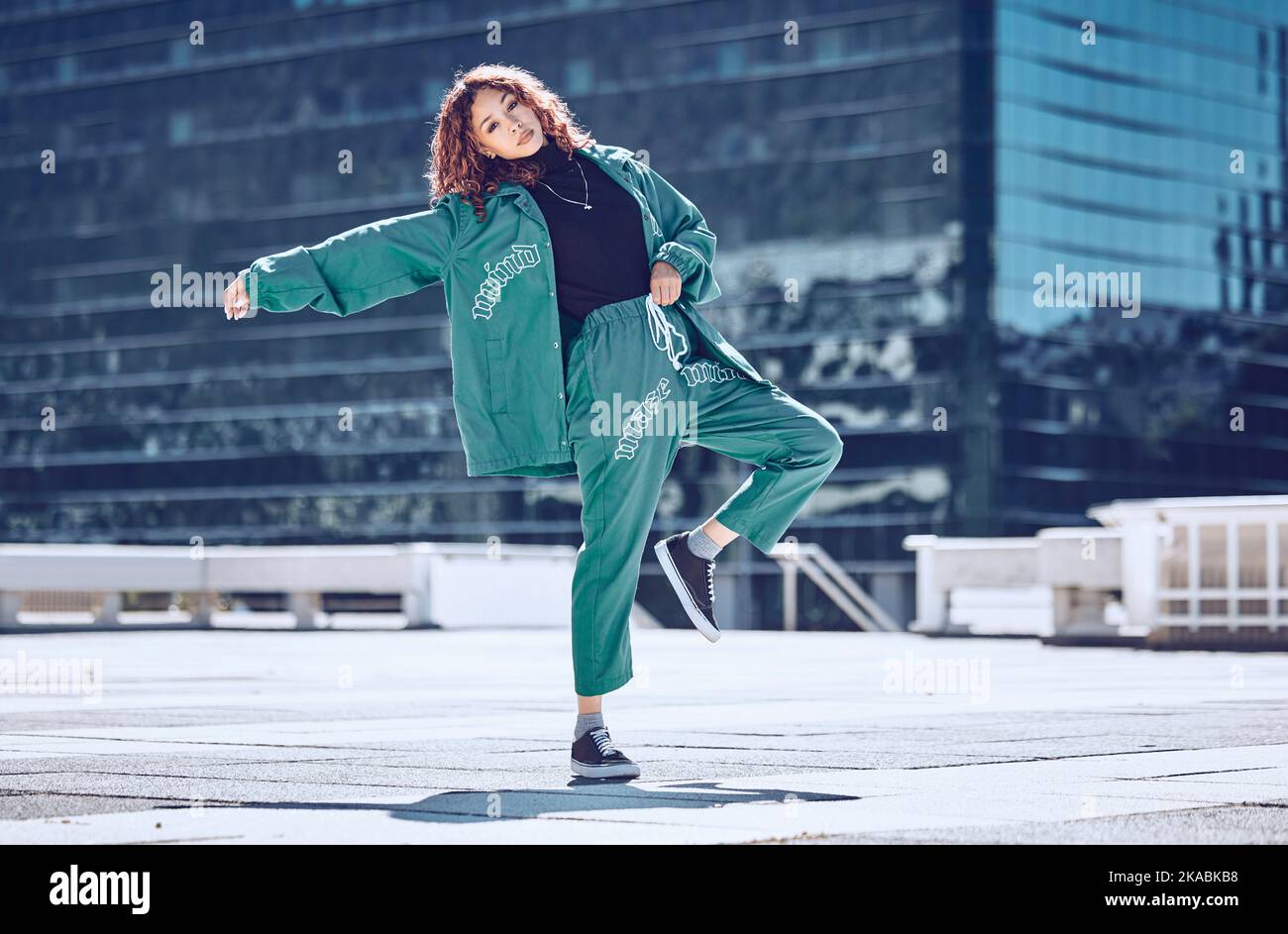 City, dance and dancing woman on a rooftop with cool hip hop street ...