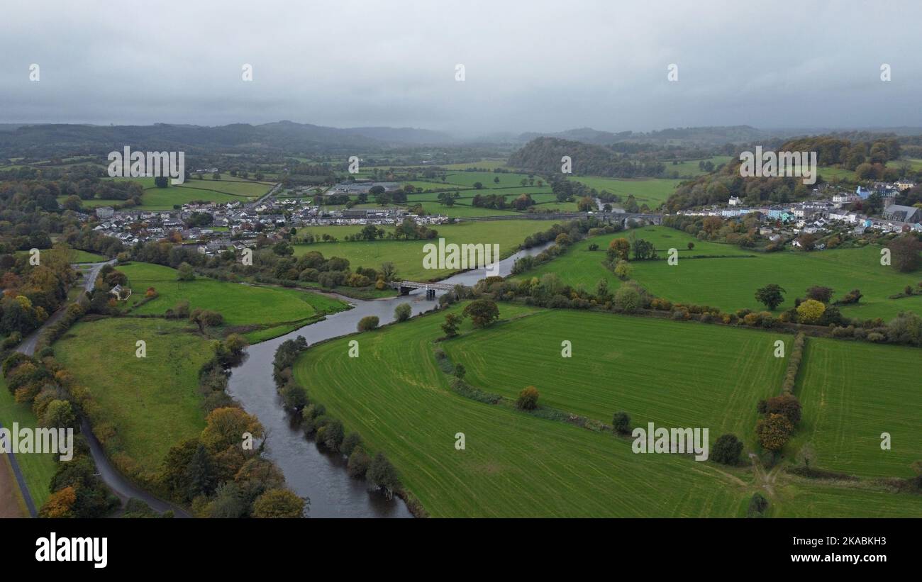 An aerial drone view of Llandeilo & the village of Fairfach, beside the ...